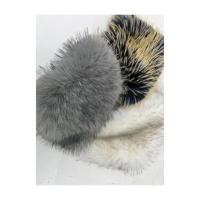 China Soft and Luxurious Knitted Backing White Fur with Black Tip Dyed Color Pom Fur Fabric for sale
