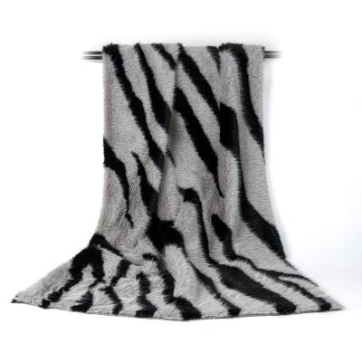 China Long Pile Faux Fur Fabric for Winter Season Strip Printed Design 150D Yarn Count for sale