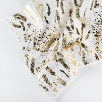 China 240gsm Soft Polyester Star Foil Printing Gold Bronzed pv plush Fabric For Making Toys for sale