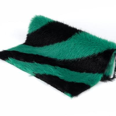 China Customizable Jacquard Artificial Long Fair Fur Fabric with 100% Polyester Back Material for sale