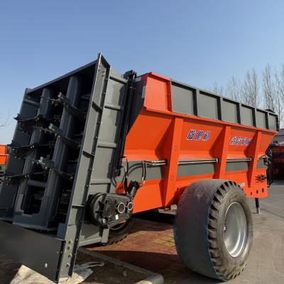 China Frozen Manure Spreader Double Vertical Auger Crusher Evenly Spread for sale