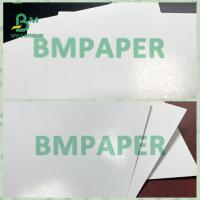 China Premium Virgin Wood Pulp Glossy Coated Paper with Smooth Finish for Professional Printing for sale