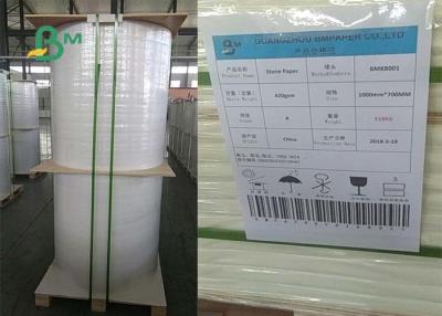 China Jumbo Roll 120gsm 240gsm 490gsm 560gsm Tearproof White Stone Wrapping Paper for sale