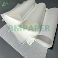 China 750 x 900mm 30gram 40gram Food Grade Greaseproof Paper For Tulip Baking Cups for sale