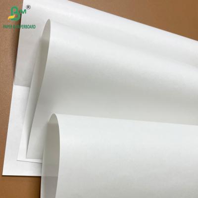 China Food Grade 35g 40g 45g Machine Glazed Bleached Kraft Paper In Reels for sale