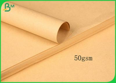 China Food Grade 50GSM Light Brown Kraft Paper Roll For Packing Roast Duck Or Popcorn for sale