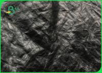 China Glossy And Textured Black Color Washable Kraft Paper Wear - Resisting Durable for sale