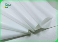 China 38gsm Oil Resistant Tear Resistant Greaseproof Muffin Wrapping Paper In Roll for sale
