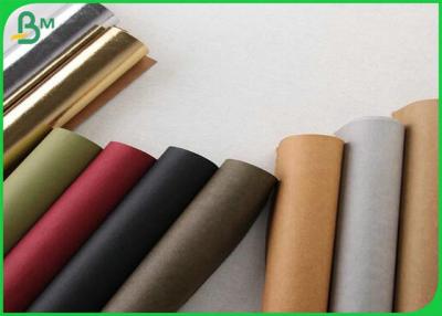 China Different Color 0.55MM Washable Kraft Fabric Roll For Making Handbags for sale