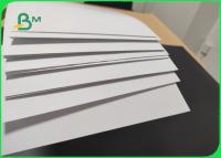 China Virgin Woodfree Paper White Bond Paper 140gsm 70 * 100cm Sheet for sale