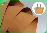 China Washable Good Flexibility 0.55mm Kraft Paper Fabric For Recyclable Wallet Making for sale