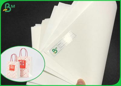 China Craft paper bags material 70g 75g White Kraft Wrapping Paper Rolls 700mm Width for sale