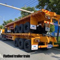 China Main Beam T700/Q345 Steel Semi-Trailer CIMC HUAJUN 3 Axle Flatbed Trailer Train for sale