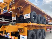China Main Beam T700/Q345 Steel Semi-Trailer CIMC HUAJUN 3 Axle Flatbed Trailer Train for sale
