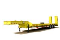 China CIMC HUAJUN 3 Axle Heavy Duty Low Bed Semi Trailer with Hydraulic Ramp Max Payload 70TON for sale