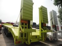 China CIMC HUAJUN 3 Axle Heavy Duty Low Bed Semi Trailer with Hydraulic Ramp Max Payload 70TON for sale