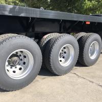 China Leaf Spring Suspension 40ft Straight Beam Container Transportation Semi-Trailer with 12 Twist Locks for sale