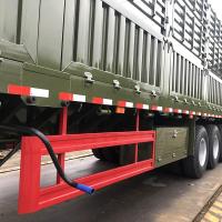 China 60 Ton Loading Capacity Semi Truck Trailer with Fence and Tarpaulin Main Beam T700/Q345 Steel for sale