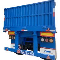 China Hot 4 Axles Flatbed Semi Trailer with 1000mm Sidewall Max Payload of 60T 12.00R20 Tire for sale