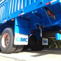 China 60T Max Payload Truck Trailer 3 Axles Fence Cargo Semi Trailer Container Twist Lock for sale