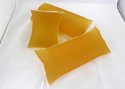 China Transparent Light Yellow Hot Melt PSA Adhesive Block for Permanent Labels - 150-180°C Operating Temperature, 12 Month Shelf Life for sale