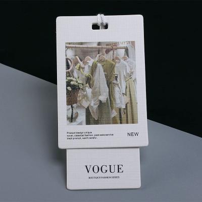 China Custom OEM Clothing Hang Tags with 250gsm-400gsm Textured Paper & Foil Stamping for Brand Labels for sale