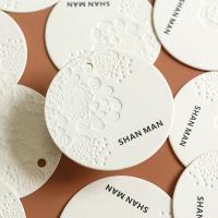 China Custom OEM Embossed Round Clothing Hang Tags with 250gsm-400gsm Premium Textured Art Paper for Fashion Brands for sale