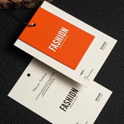 China Custom OEM Hang Tags and Clothing Labels with 250gsm-400gsm Coated Art Paper and Offset Printing for sale