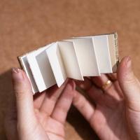 China Custom OEM Mini Accordion Fold Notebook with Fabric Covers Acid-Free Writing Paper and Palm-Sized Design for sale