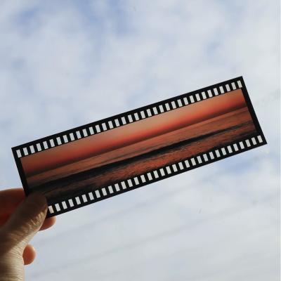 China Custom OEM Film Strip Transparent Card with UV Full-Color Printing and Precision Die-Cutting for Unique Bookmark Designs for sale