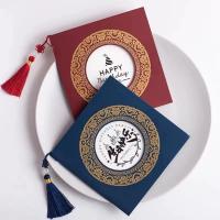 China Custom OEM Luxury Greeting Cards with Hot Foil Stamping Die-Cut Hollow and Handmade Tassel Decoration for sale