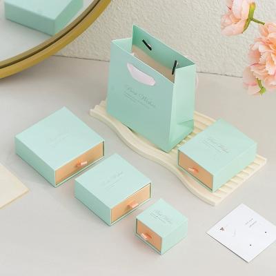 China Minimalist Slide Drawer Gift Box With Ribbon Pull For Jewelry Packaging for sale
