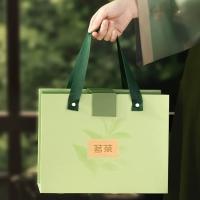 China Book Shaped Magnetic Packaging Gift Box With Handles For Loose Leaf Tea for sale