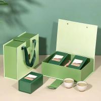 China Book Shaped Magnetic Packaging Gift Box With Handles For Loose Leaf Tea for sale