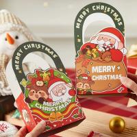 China Christmas Gift Boxes Cartoon Santa Pattern Paper Tote With Arch Handle for sale