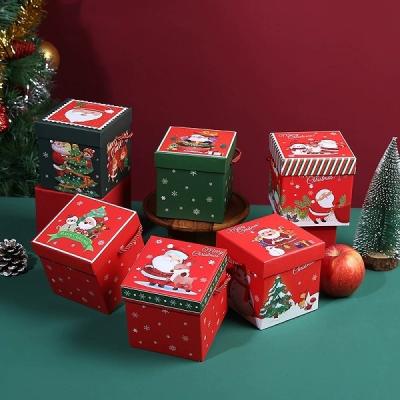 China Christmas Rigid Packaging Box With Rope Handle For Apple And Holiday Gifts for sale