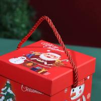 China Christmas Rigid Packaging Box With Rope Handle For Apple And Holiday Gifts for sale
