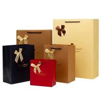China Paper Gift Shopping Bags with Satin Ribbon Bow Knot Handles for Luxury Retail for sale