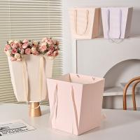 China Trapezoidal Paper Flower Bags with Ribbon Handles for Gift Packaging for sale