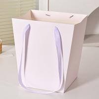 China Trapezoidal Paper Flower Bags with Ribbon Handles for Gift Packaging for sale
