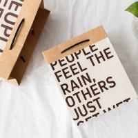 China Kraft Paper Shopping Bag with Rope Handle for Retail Packaging for sale