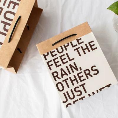 China Kraft Paper Shopping Bag with Rope Handle for Retail Packaging for sale