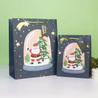 China Holiday Paper Gift Bags with Handles and Foil Stamped Merry Christmas Print for sale