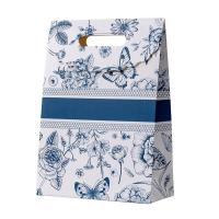 China Floral Printed Paper Gift Bags with Die Cut Handle and Flap Top for sale