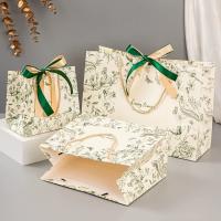 China Vintage Floral Paper Gift Bags with Ribbon Closure for Boutique Retail for sale