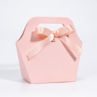 China Paper Gift Bags With Die-Cut Handle And Ribbon Bow For Retail Packaging for sale