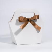 China Paper Gift Bags With Die-Cut Handle And Ribbon Bow For Retail Packaging for sale