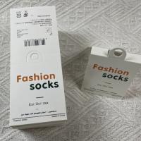 China Folded Paper Sock Tags With Euro Hole And Barcode For Retail Hosiery Display for sale