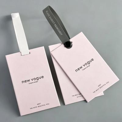 China Paper Hang Tags With Tamper-Evident Loop Fasteners For Apparel Branding for sale