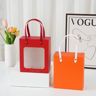 China Window Paper Gift Bags With Handles For Retail And Boutique Packaging for sale